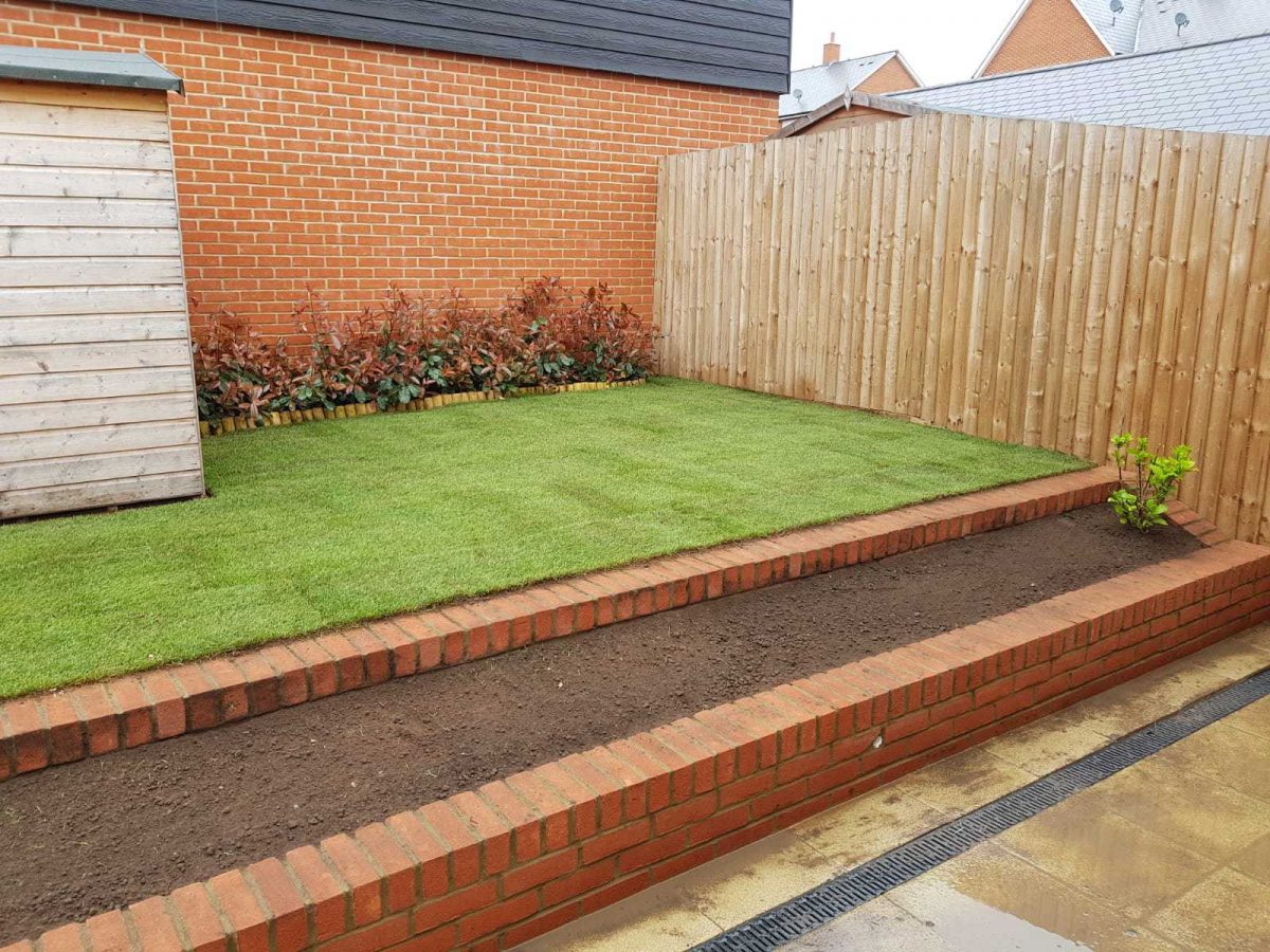 Turf and retaining wall – TS Drives & Landscapes